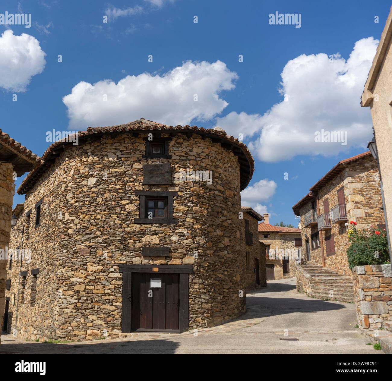 Stone houses and stone streets in the medieval village of Horcajuelo de ...