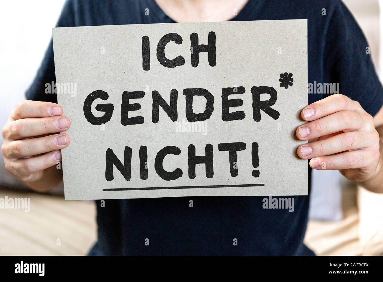 1 February 2024: A man holds a poster with the inscription: I Gender ...