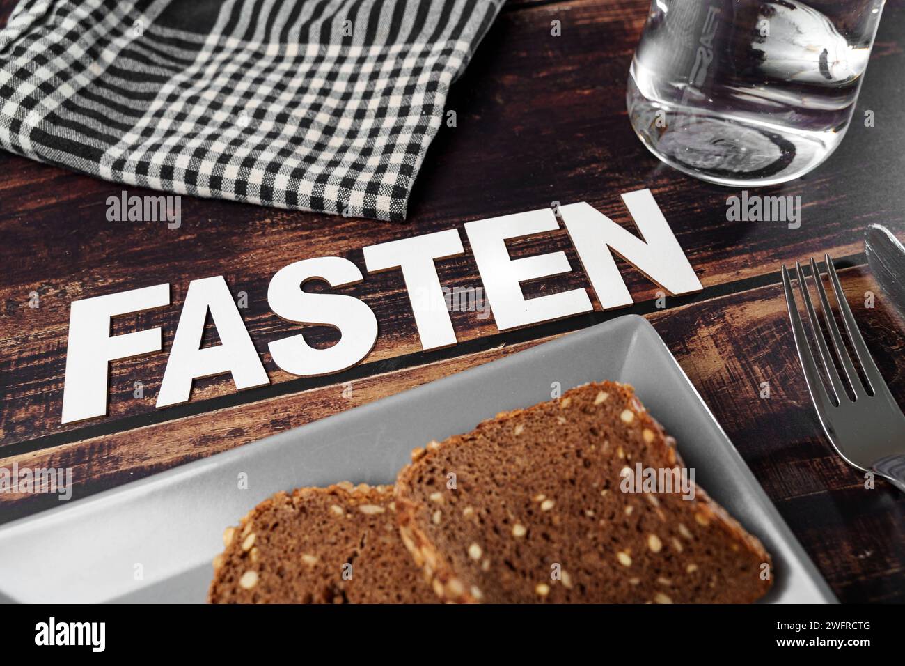 Augsburg, Bavaria, Germany - January 31, 2024: Fasting on a wooden ...