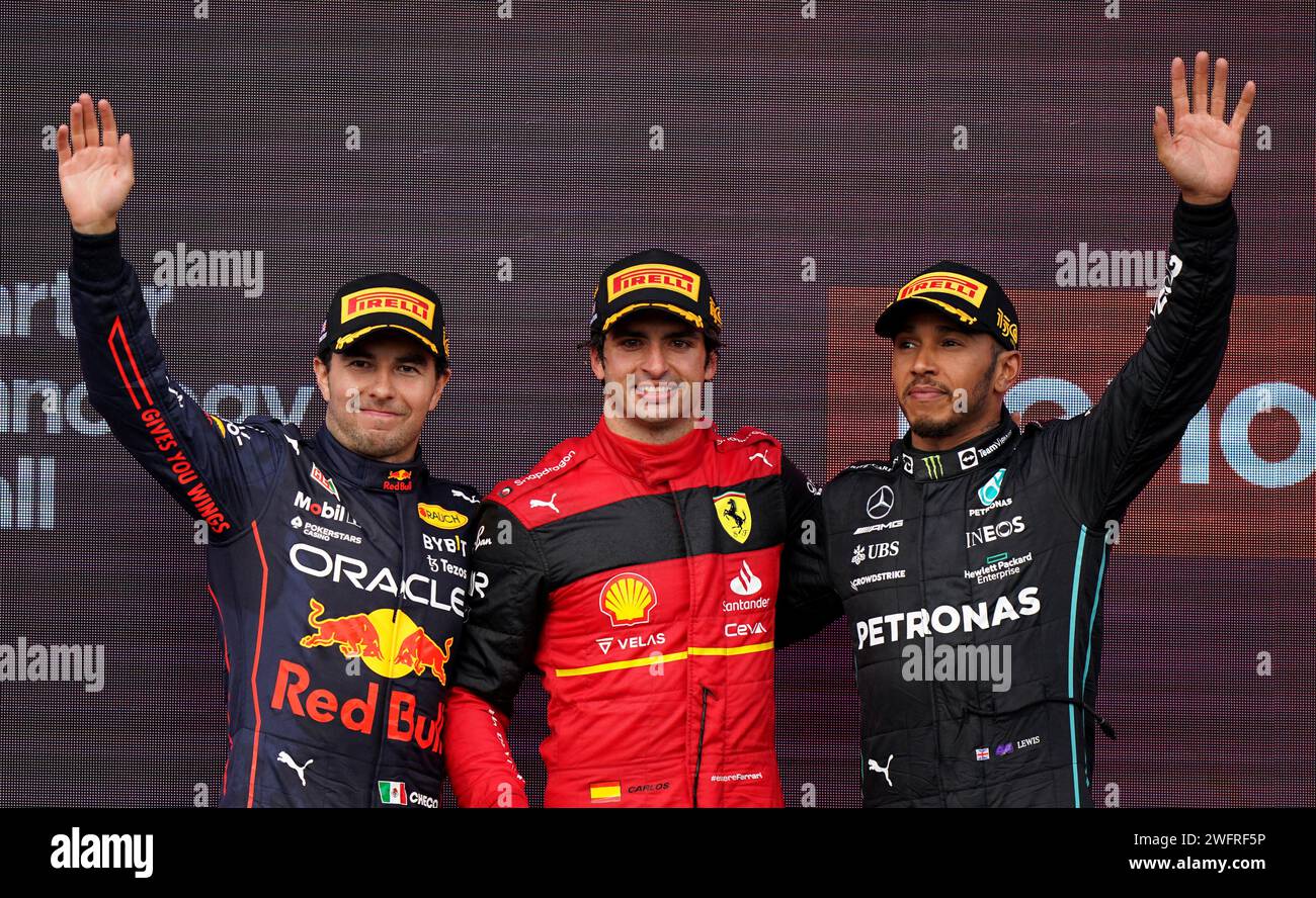 File photo dated 03-07-2022 of Mercedes' Lewis Hamilton on the podium with Ferrari's Carlos ...