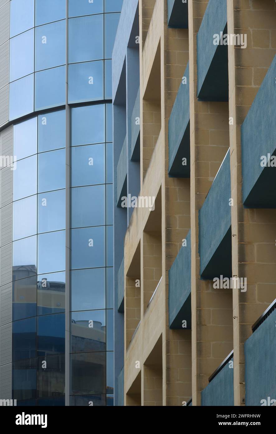 Close-up of a building showcasing contrasting architectural materials ...