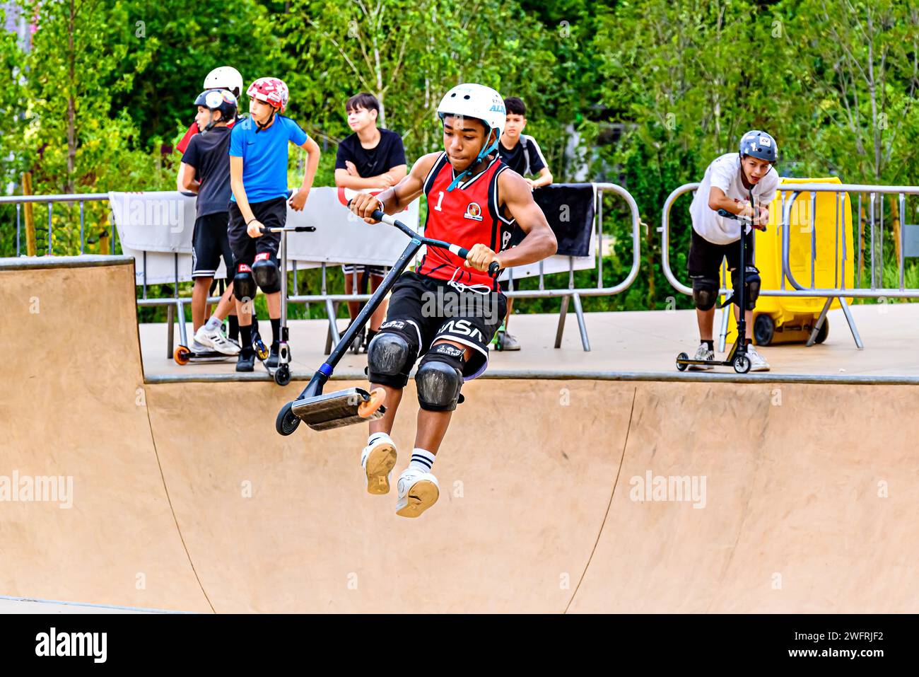 Igualada, Barcelona; July 16, 2023: Young man practicing Scootering ...