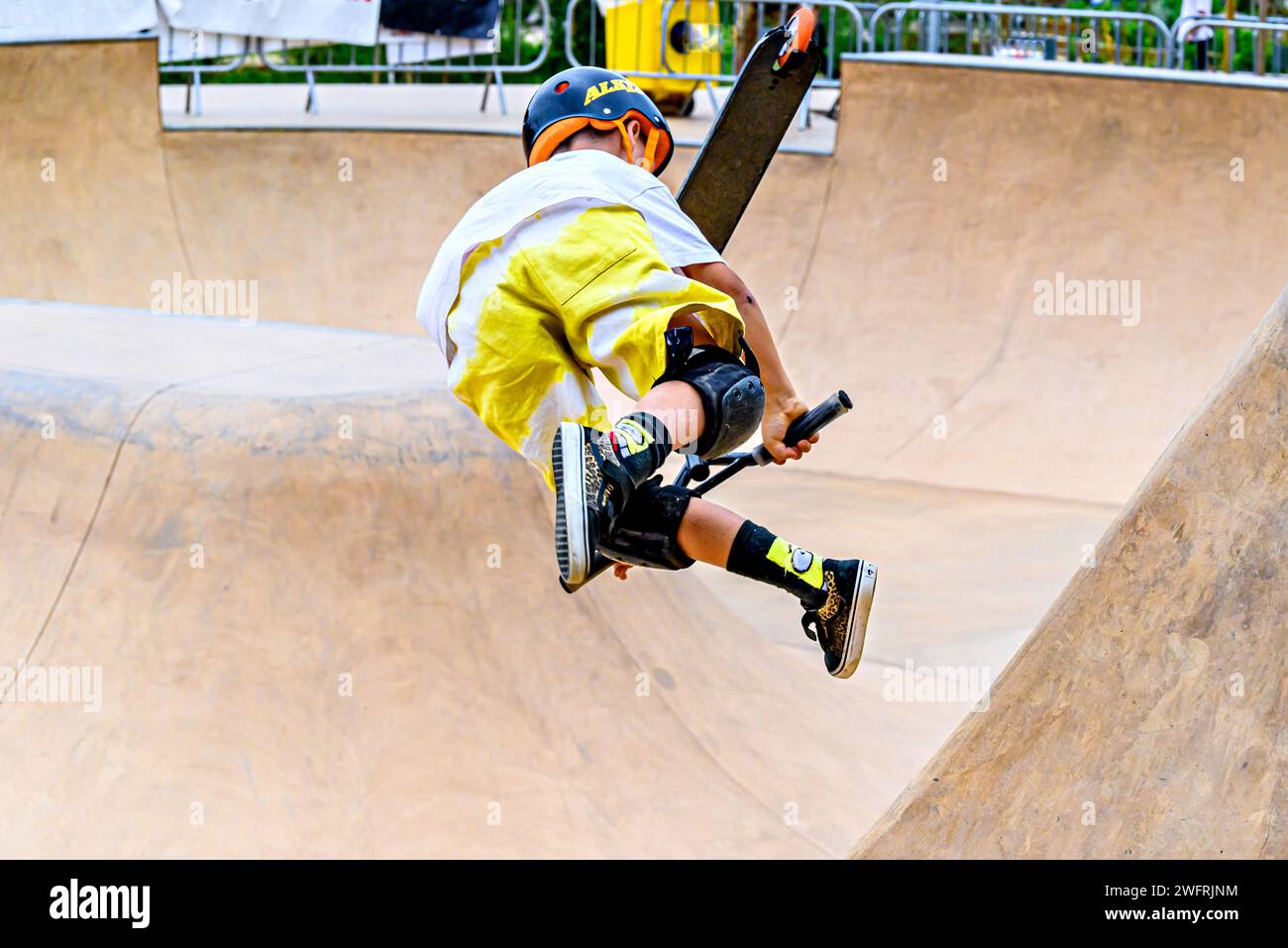 Igualada, Barcelona; July 16, 2023: Young man practicing Scootering ...