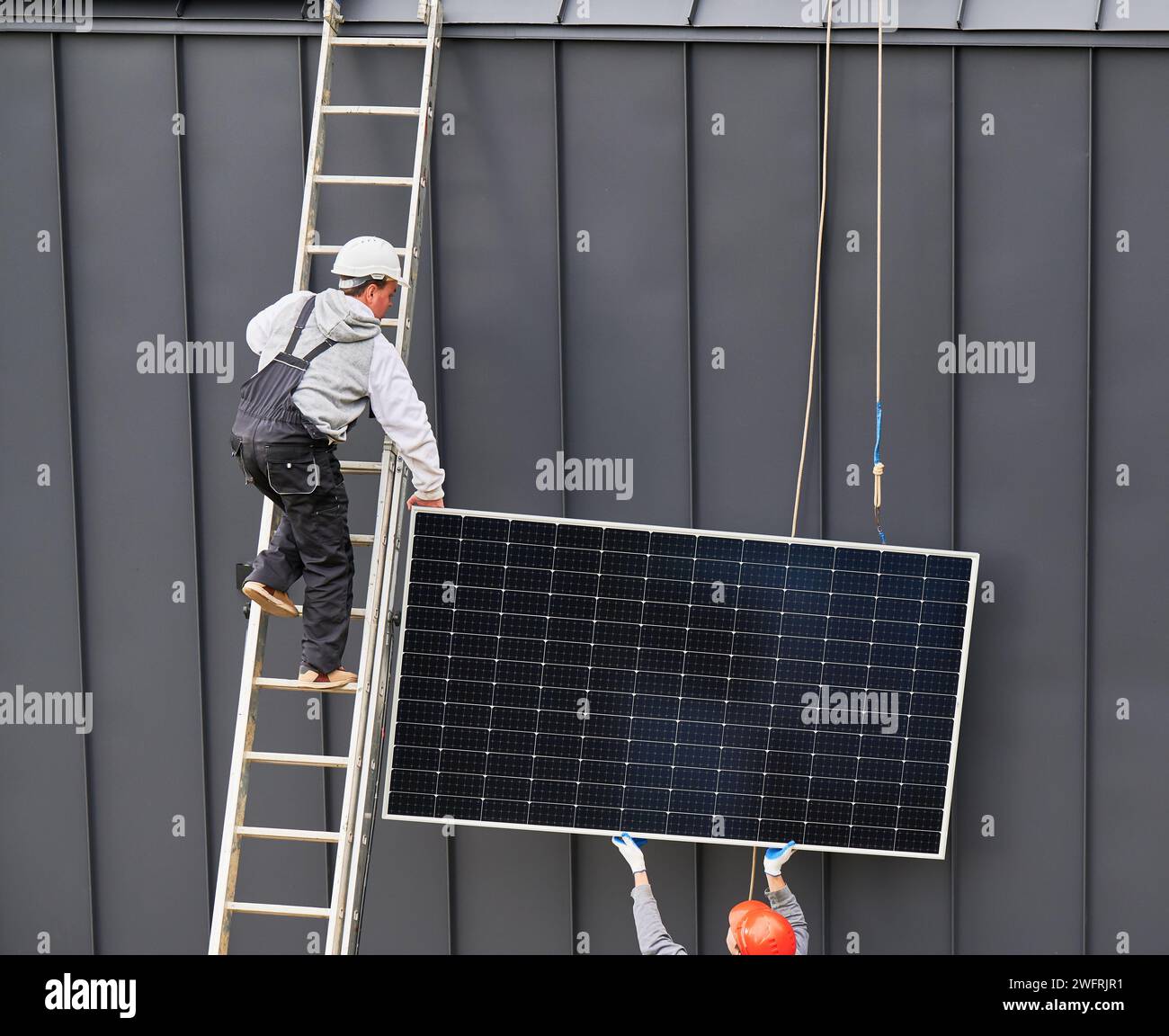 Solar panel up ladder hi-res stock photography and images - Alamy