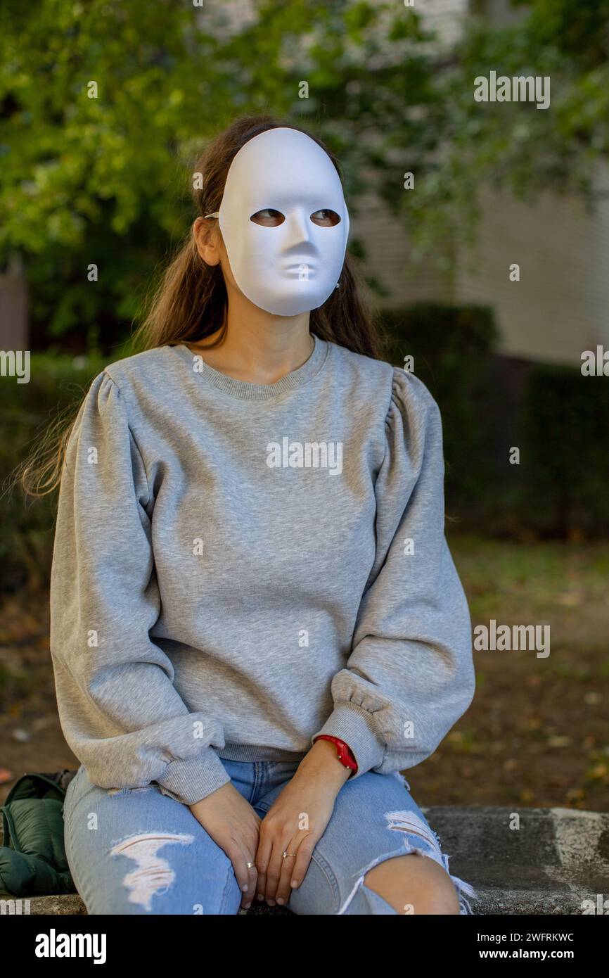 woman with full face white mask Stock Photo - Alamy