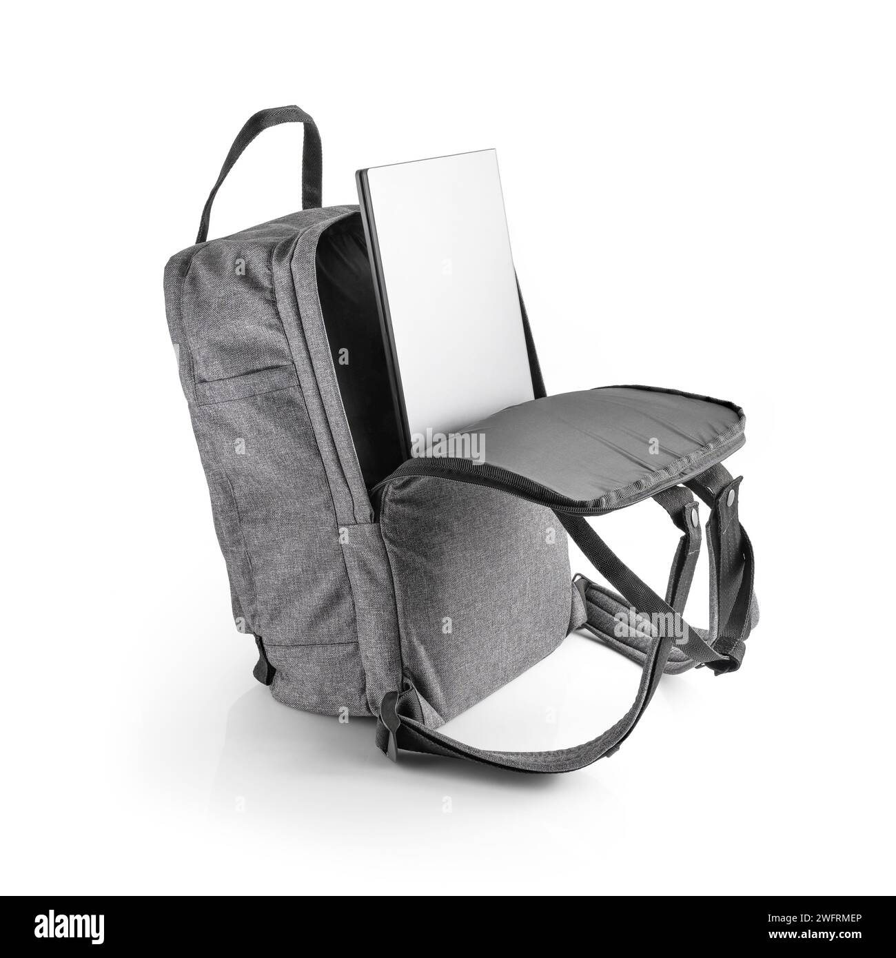 Gray fabric backpack with a laptop in the back compartment. Casual ...