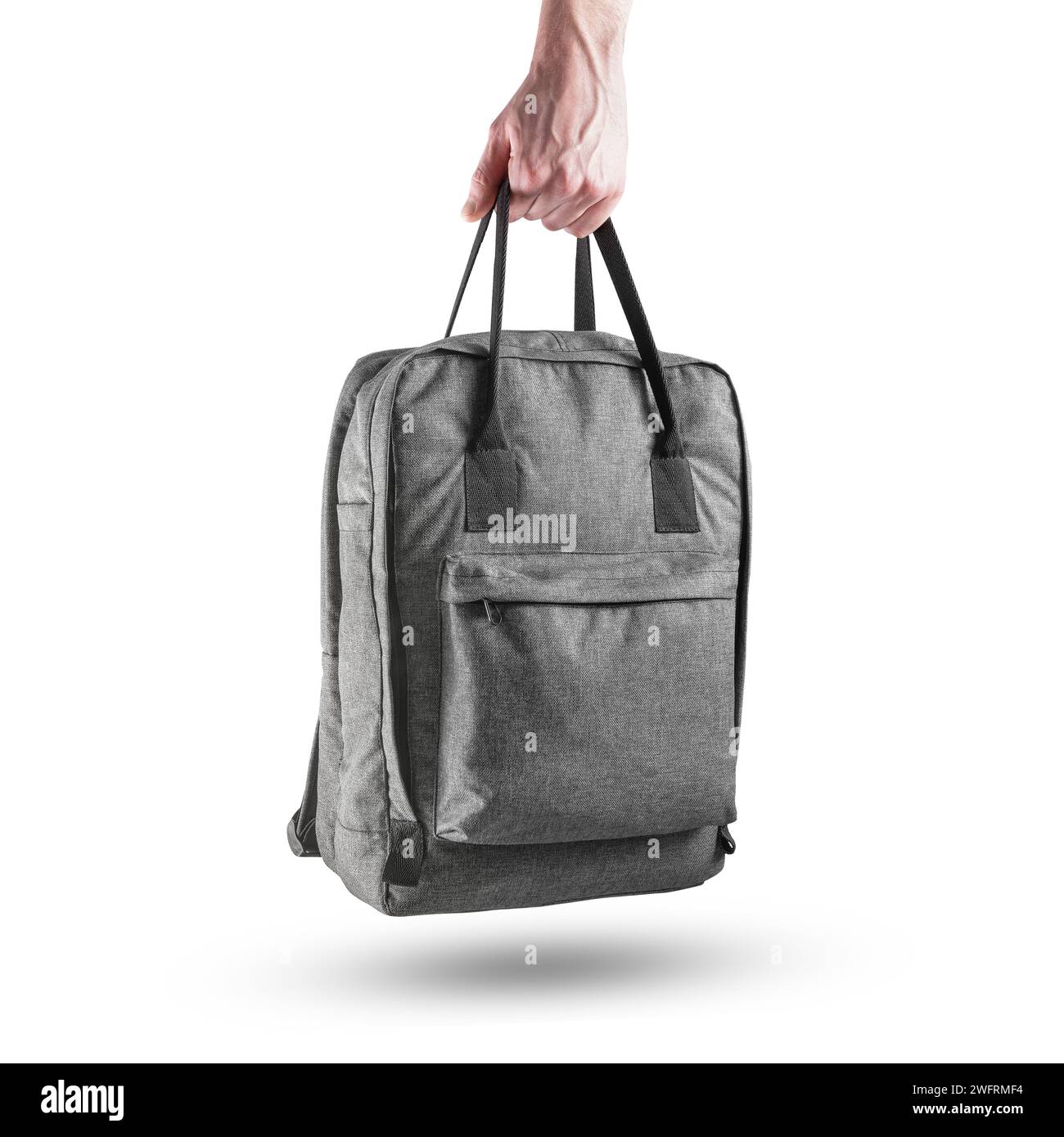 Grey casual backpack in the human hand. Fabric rucksack with handles ...
