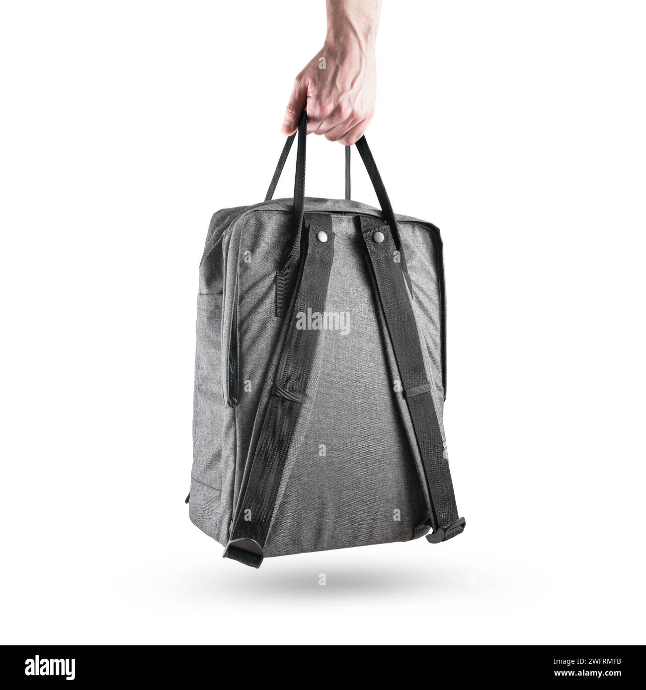 Grey casual backpack in the human hand. Fabric rucksack with handles ...