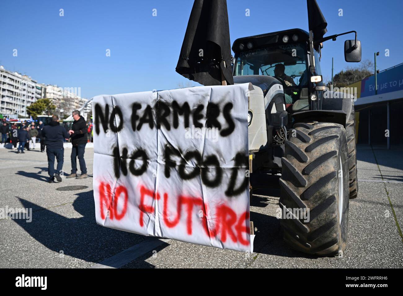Protesting farmers with their tractors take part in a rally outside an ...