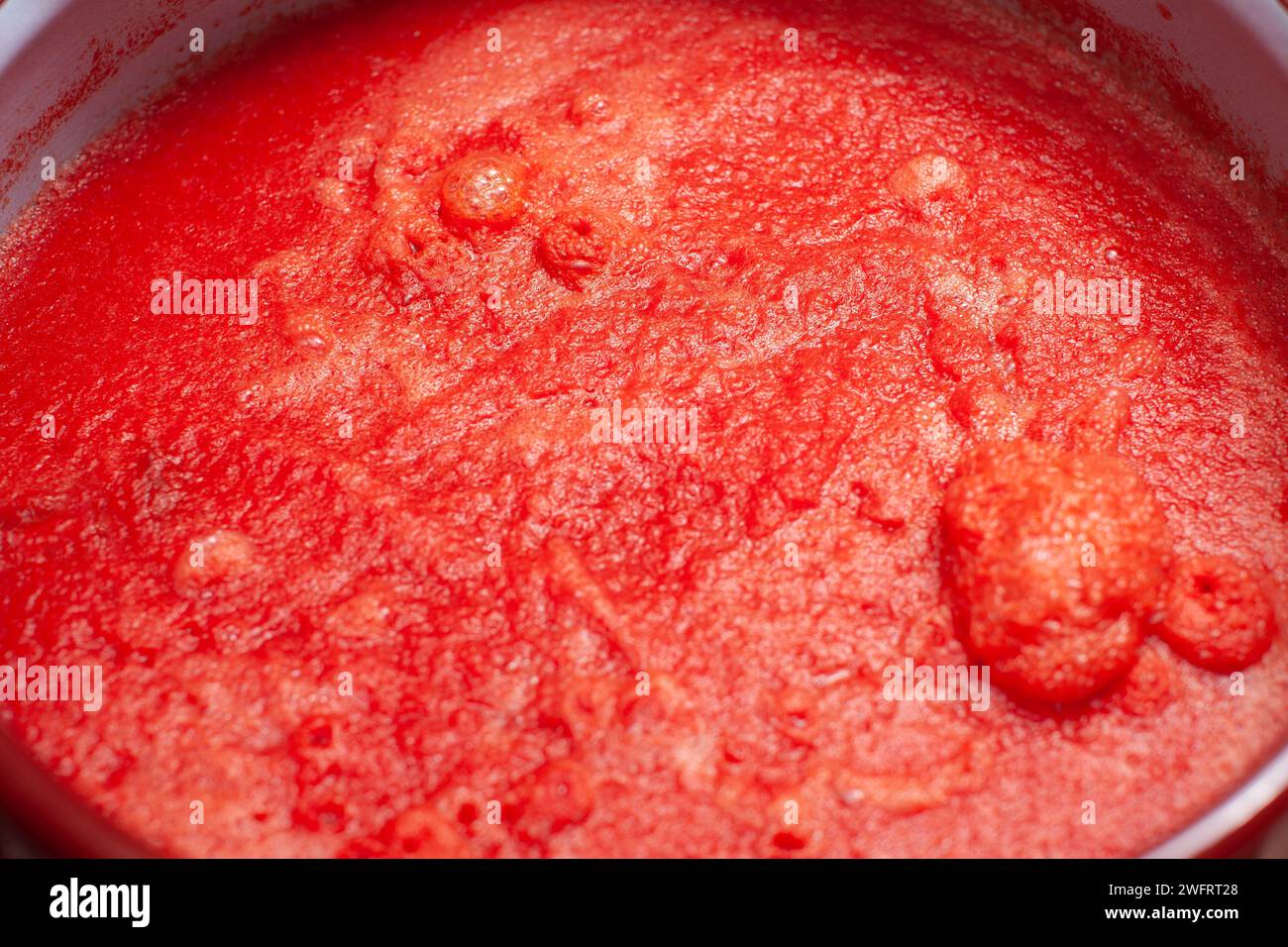 tomato sauce cooked in pot Stock Photo - Alamy