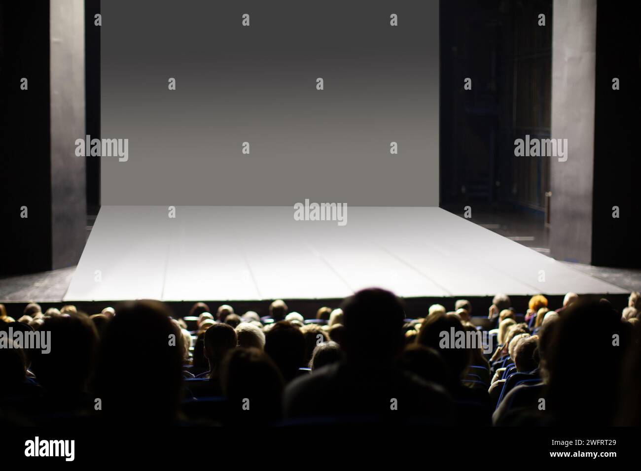 people watching empty theater stage Stock Photo - Alamy
