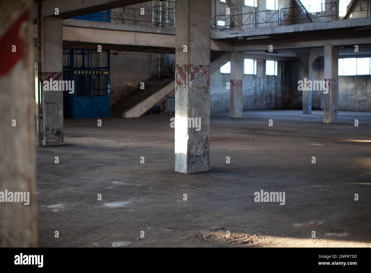 old empty factory interior with windows Stock Photo - Alamy
