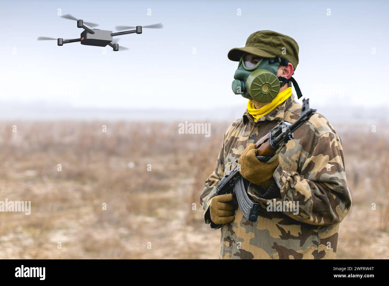 Soldier with drone and gas mask standing ready Stock Photo - Alamy