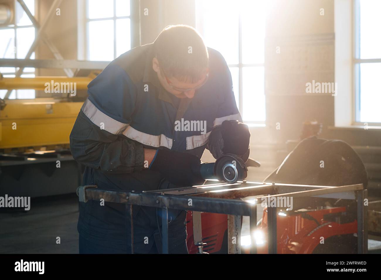 Type of industrial machine for cutting sheets of iron or metal ...