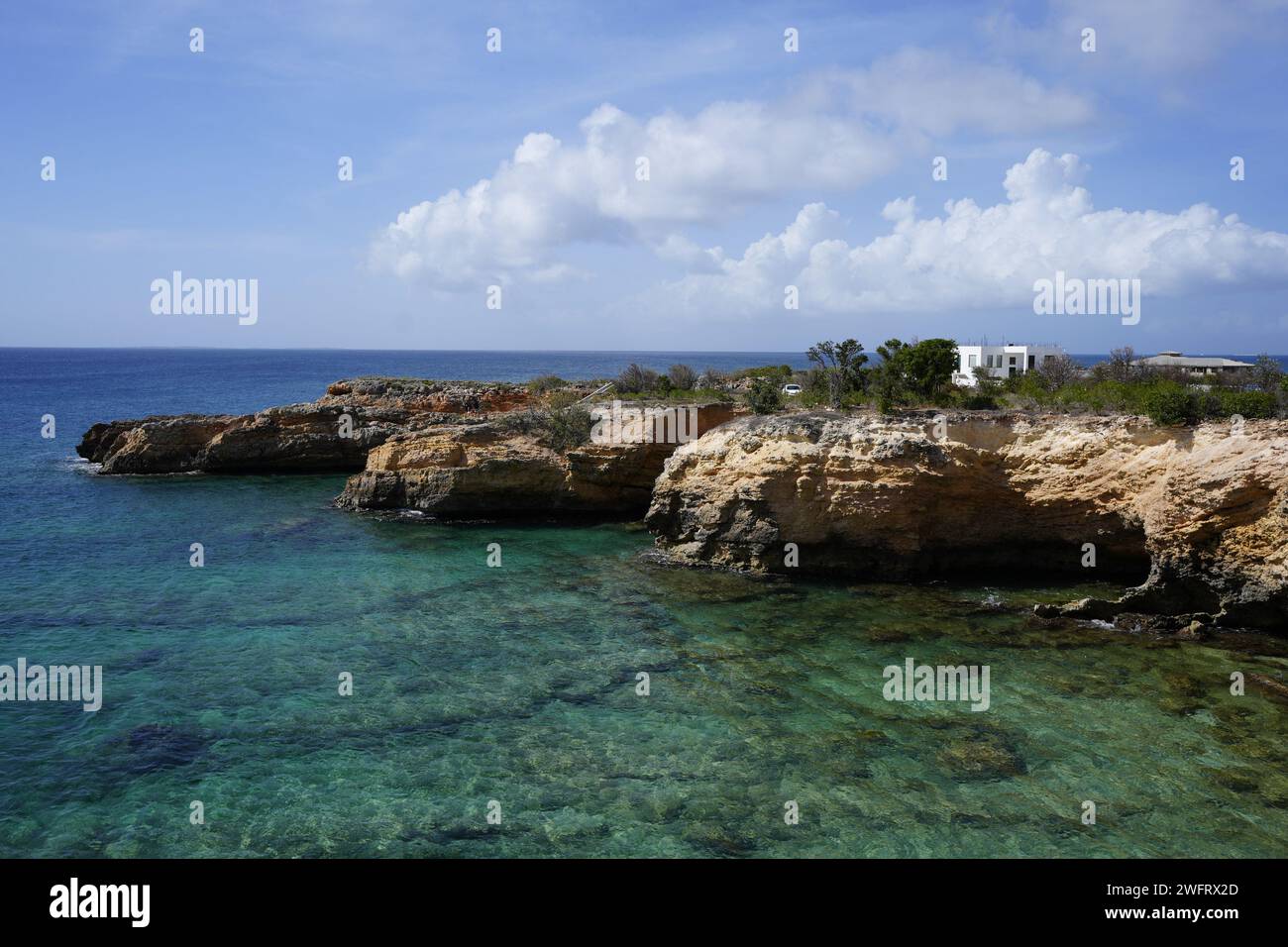 An areal view of The Anguilla Arch merging with the azure waters Stock ...