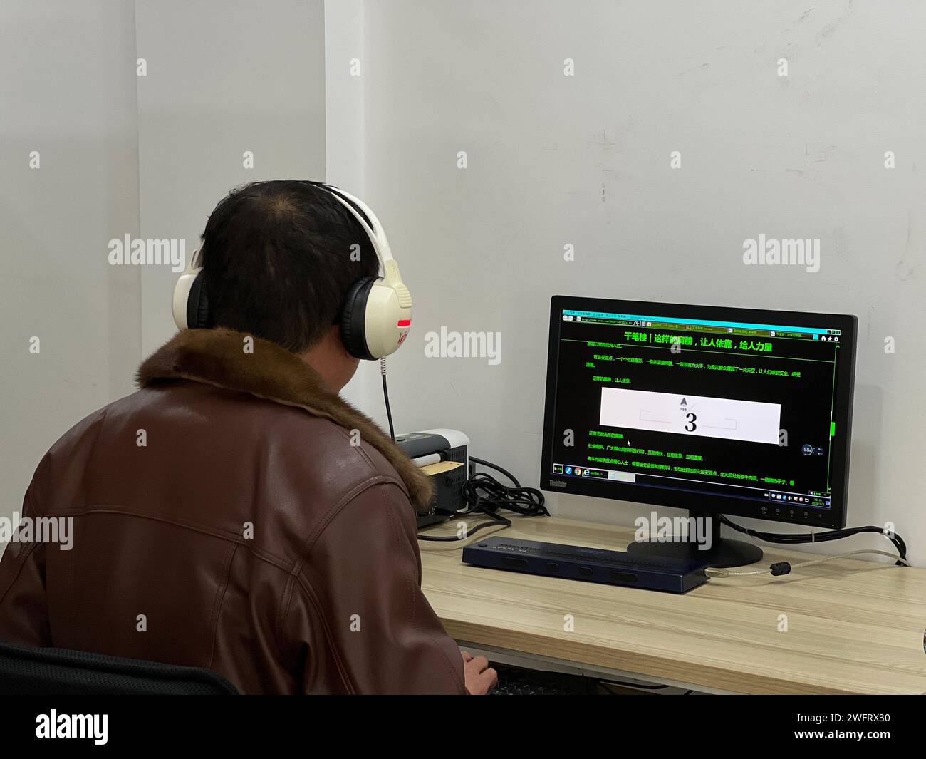 Kunming, China's Yunnan Province. 3rd Jan, 2024. Peng Bin uses a ...