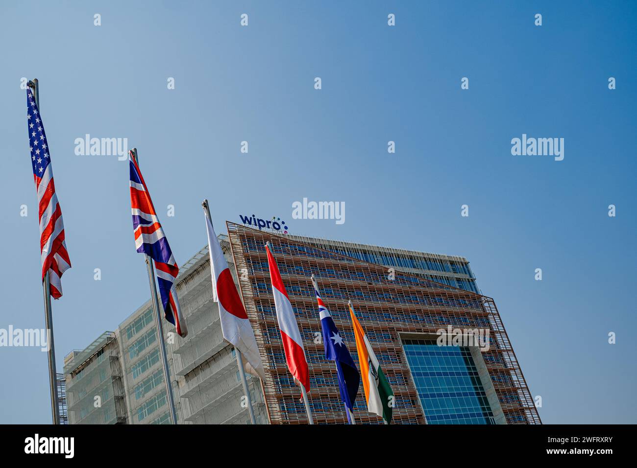 Wipro logo is shown at the top of their building. Wipro Ltd. is a ...