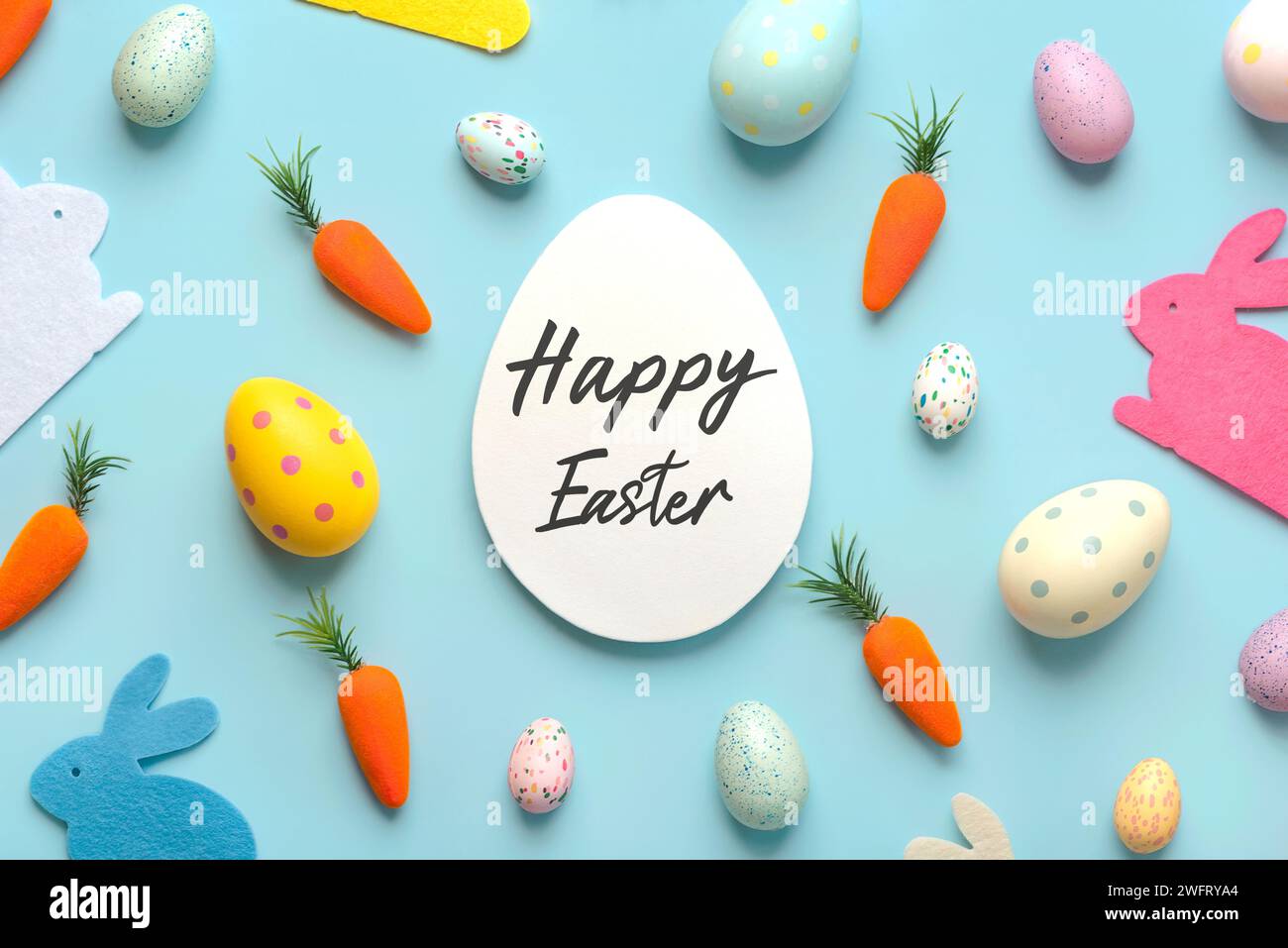 Happy Easter. Composition with colorful easter eggs,easter bunnies and ...