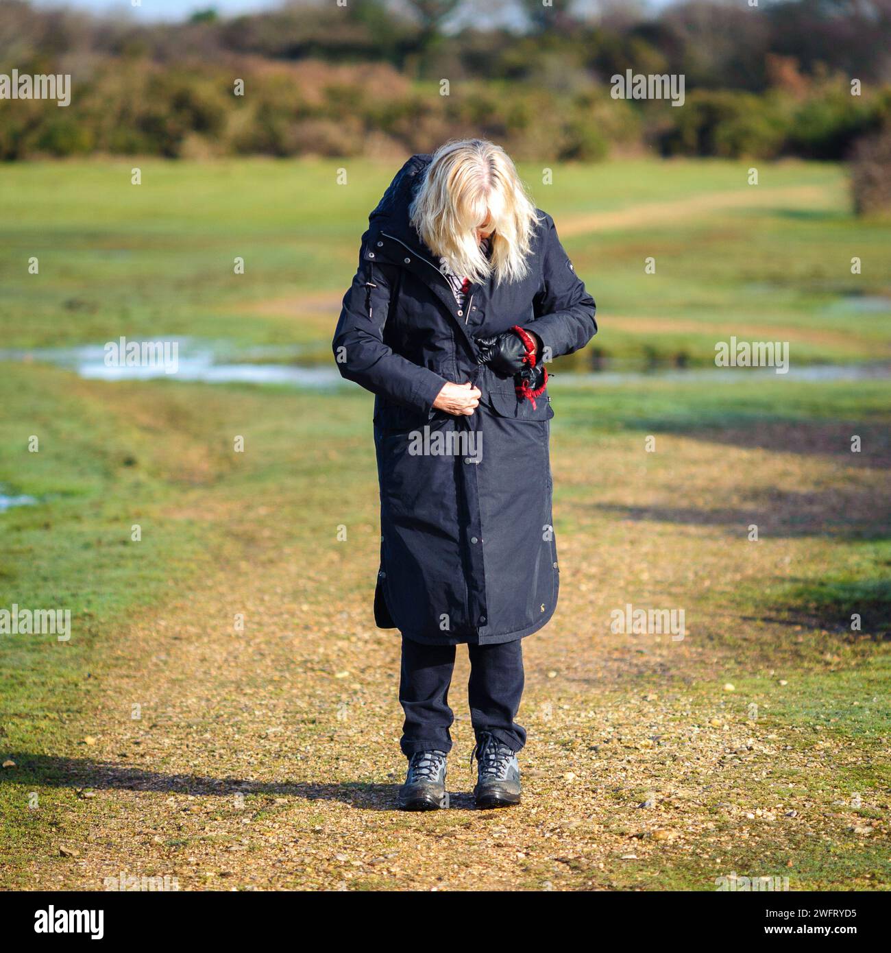 Fastening a coat hi-res stock photography and images - Alamy