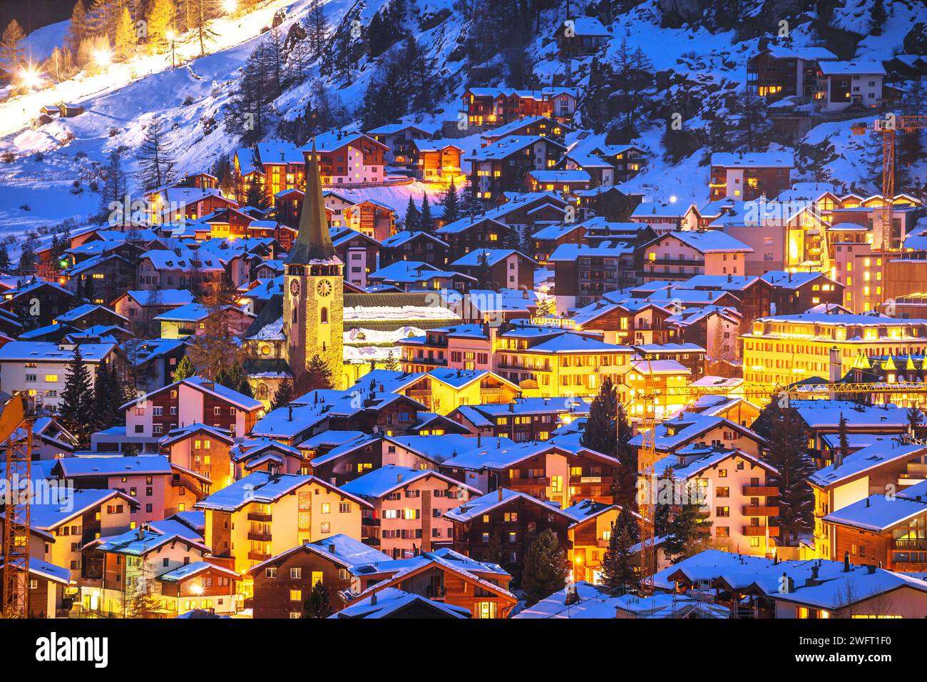 Idyllic village of Zermatt rooftops evening view, luxury winter ...