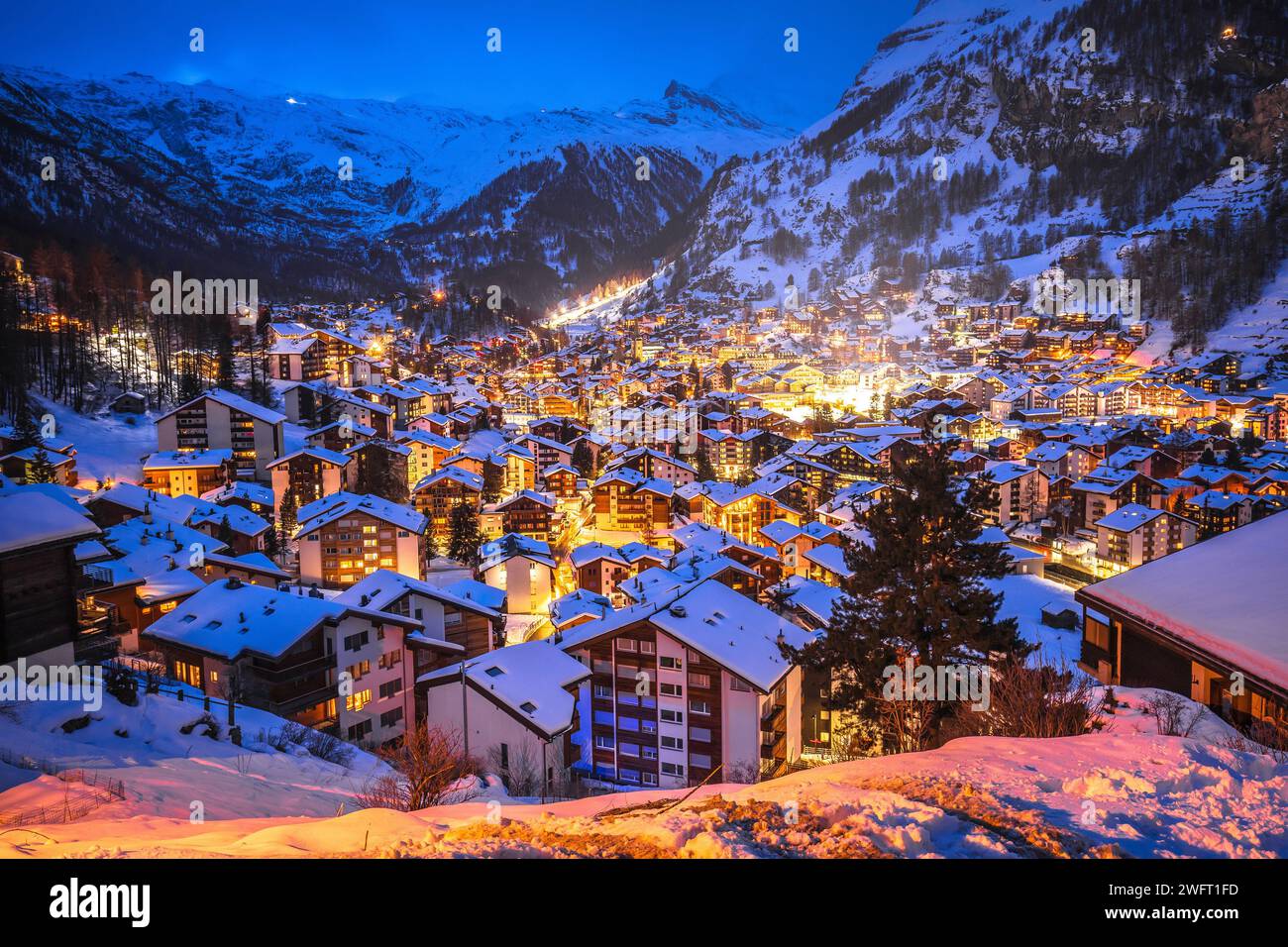 Idyllic village of Zermatt rooftops evening view, luxury winter ...