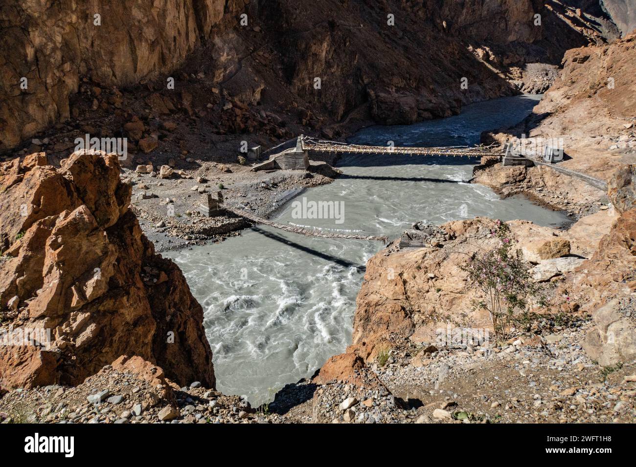 Traditional bridge across the Tsarab Chu River, Phugtal, (Phuktal ...