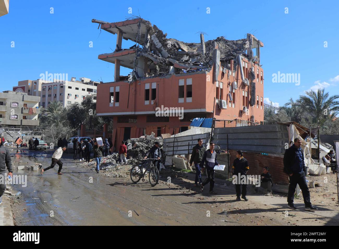 Palestinians inspect the rubbles of demolished buildings after Israeli ...