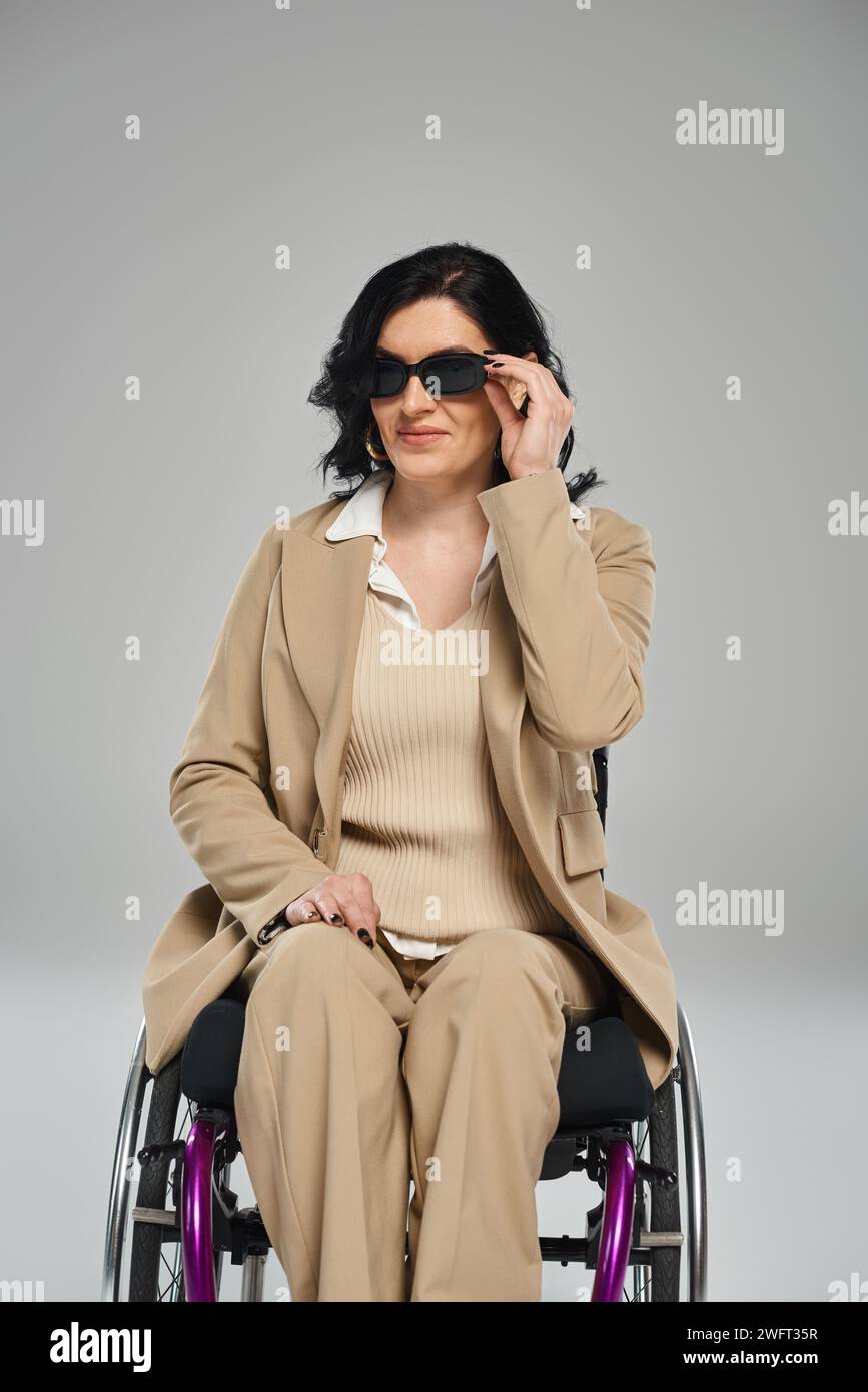 cheerful beautiful woman with disability in wheelchair wearing ...