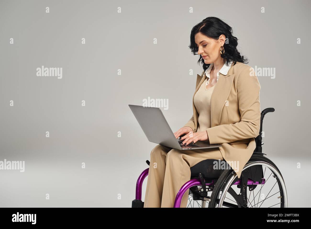 beautiful confident disabled woman in wheelchair wearing pastel suit ...