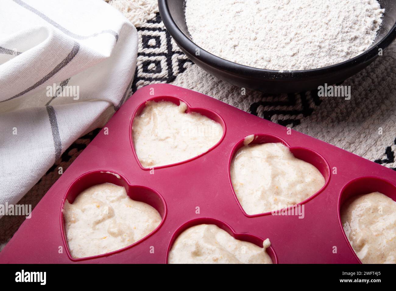 Heart-Shaped Muffins in Preparation close up Stock Photo - Alamy
