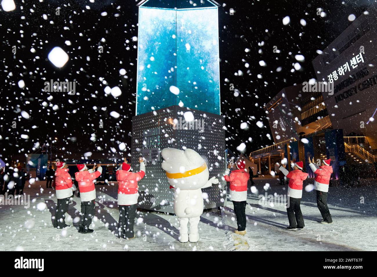 Gangneung, Korea. 1st Feb, 2024. The mascot Moongcho (C) and volunteers ...