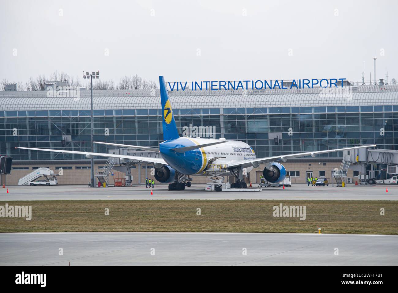 Ukraine International Airlines Boeing 777-200 boarding at Lviv Airport ...