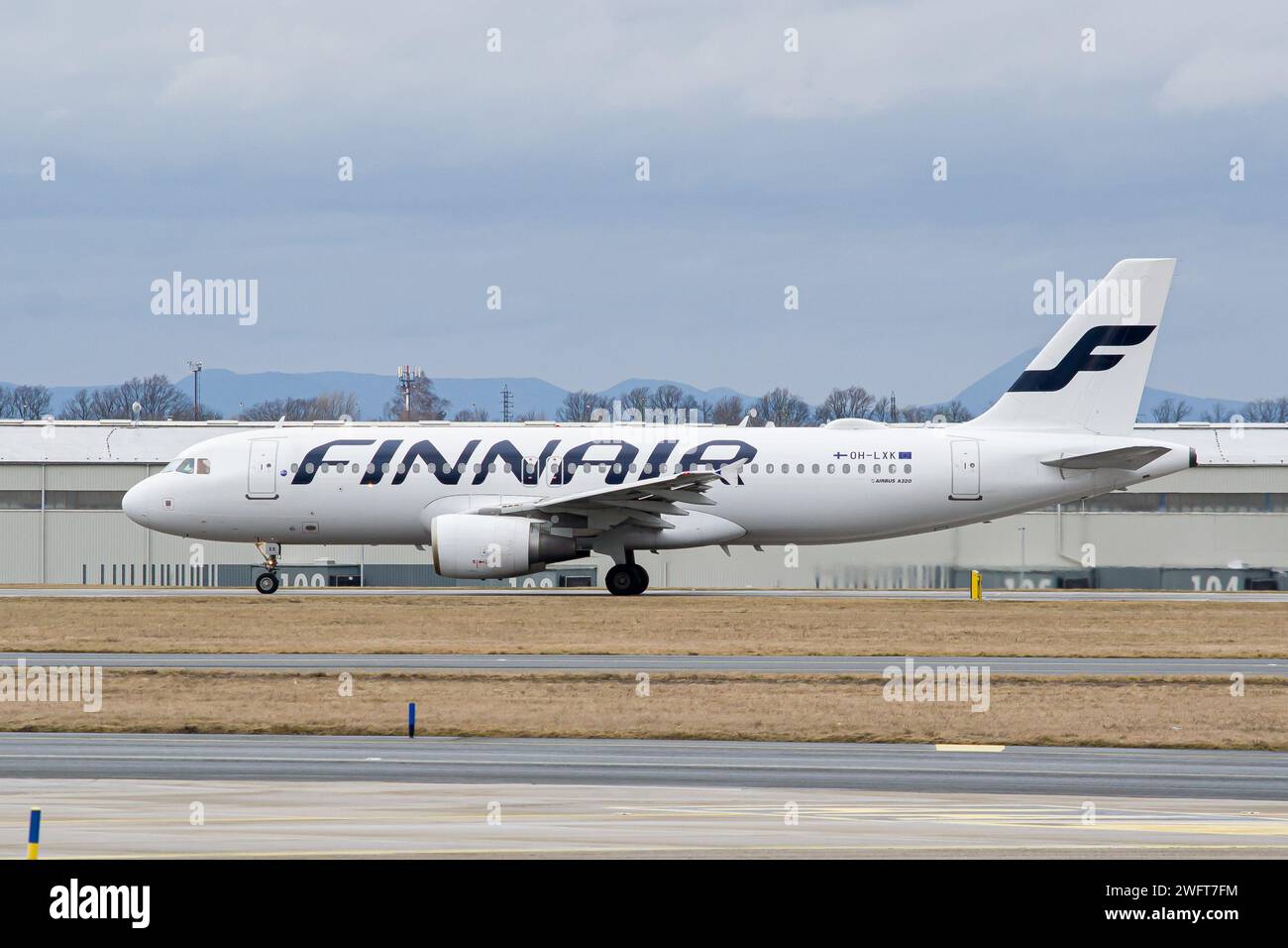Finnair Airbus A320 starting its takeoff roll at Prague Airport Stock ...