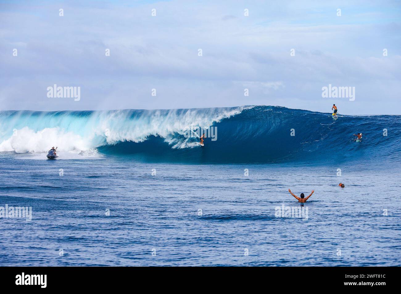 French Polynesia, Tahiti, surfing site at Teahupo'o: surfer surfing a ...