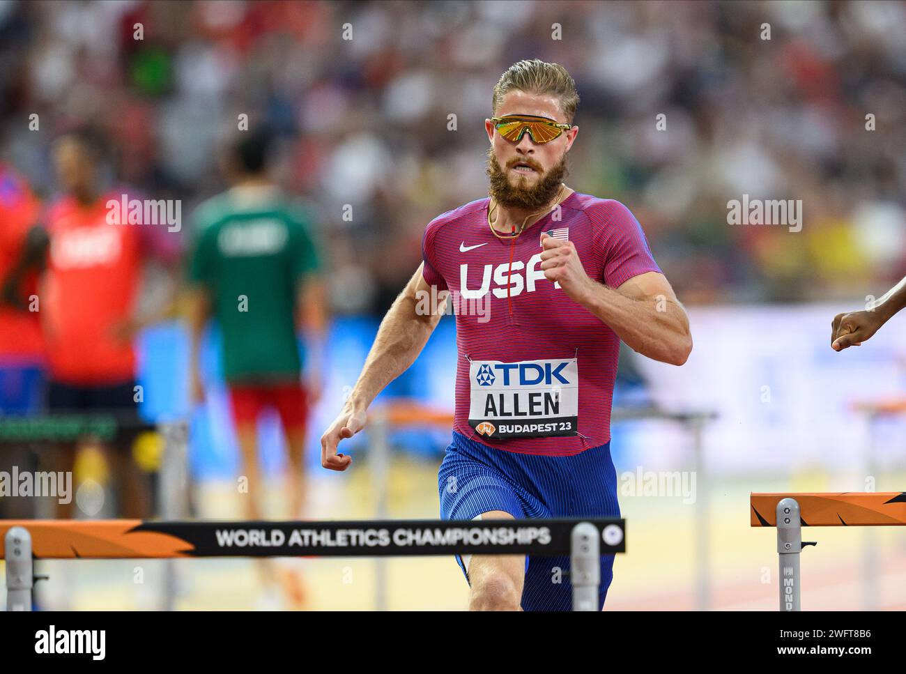 CJ ALLEN participating in the 400 meters hurdles at the World Athletics ...
