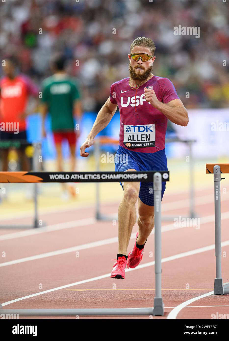 CJ ALLEN participating in the 400 meters hurdles at the World Athletics ...