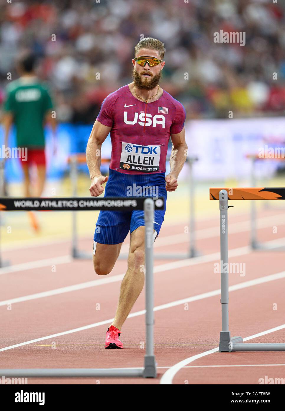 CJ ALLEN participating in the 400 meters hurdles at the World Athletics ...