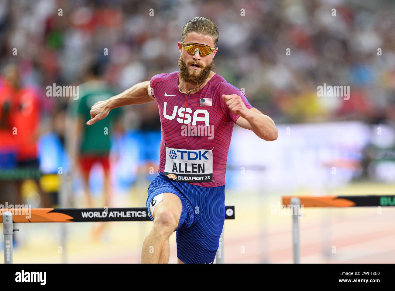 CJ ALLEN participating in the 400 meters hurdles at the World Athletics ...
