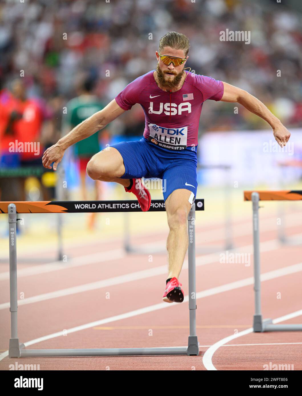 CJ ALLEN participating in the 400 meters hurdles at the World Athletics ...