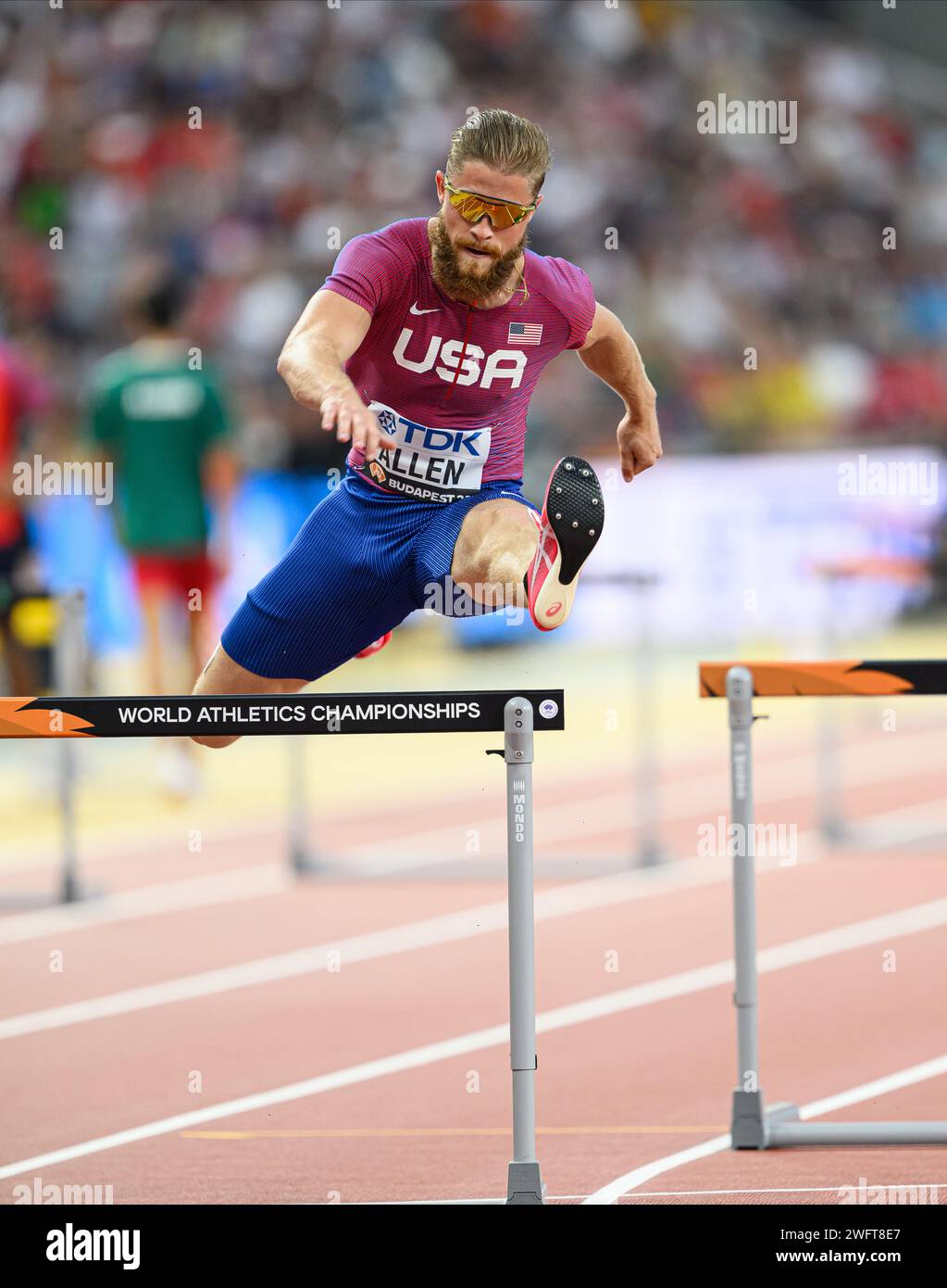 CJ ALLEN participating in the 400 meters hurdles at the World Athletics ...