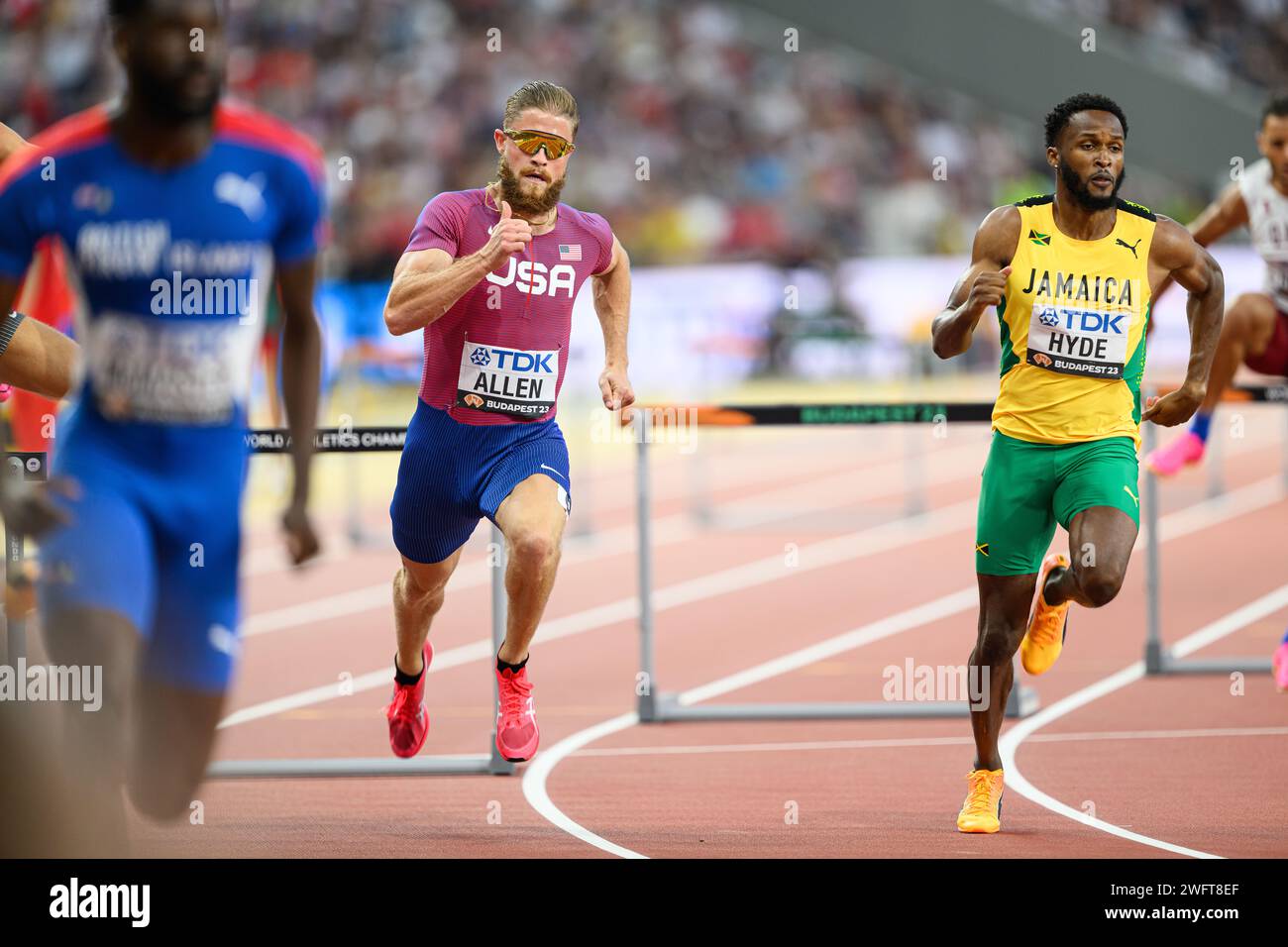 CJ ALLEN participating in the 400 meters hurdles at the World Athletics ...