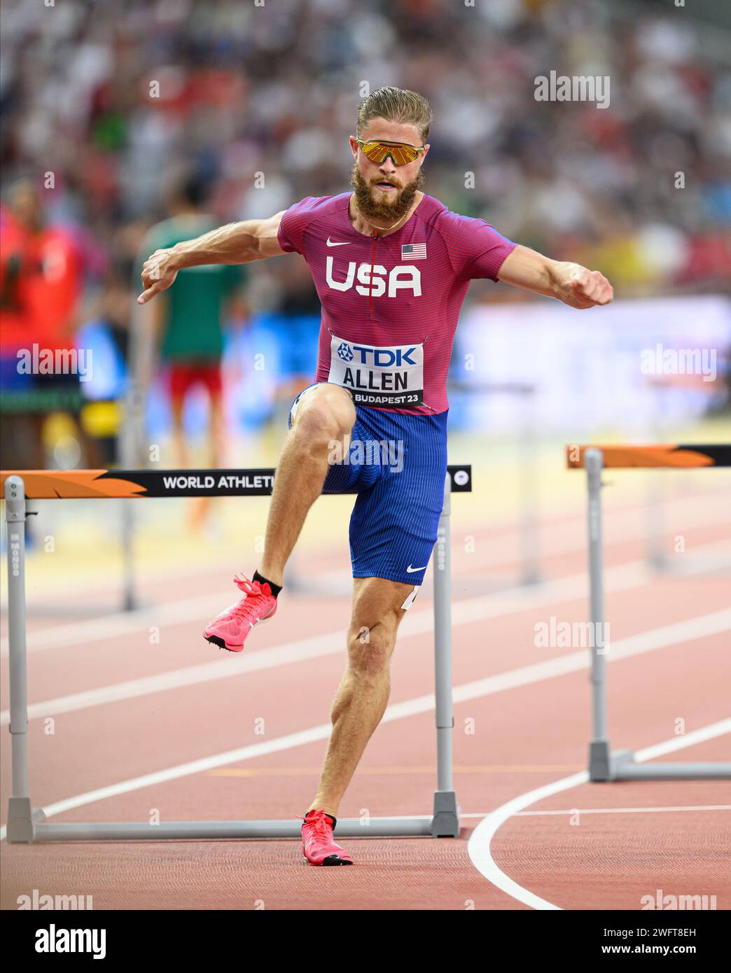 CJ ALLEN participating in the 400 meters hurdles at the World Athletics ...
