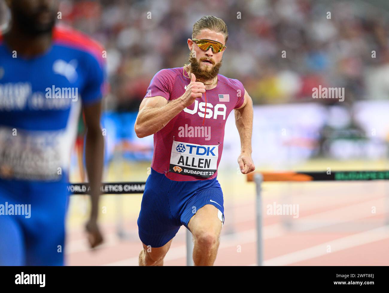 CJ ALLEN participating in the 400 meters hurdles at the World Athletics ...