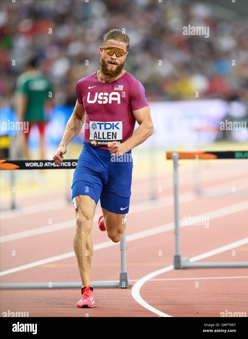 CJ ALLEN participating in the 400 meters hurdles at the World Athletics ...