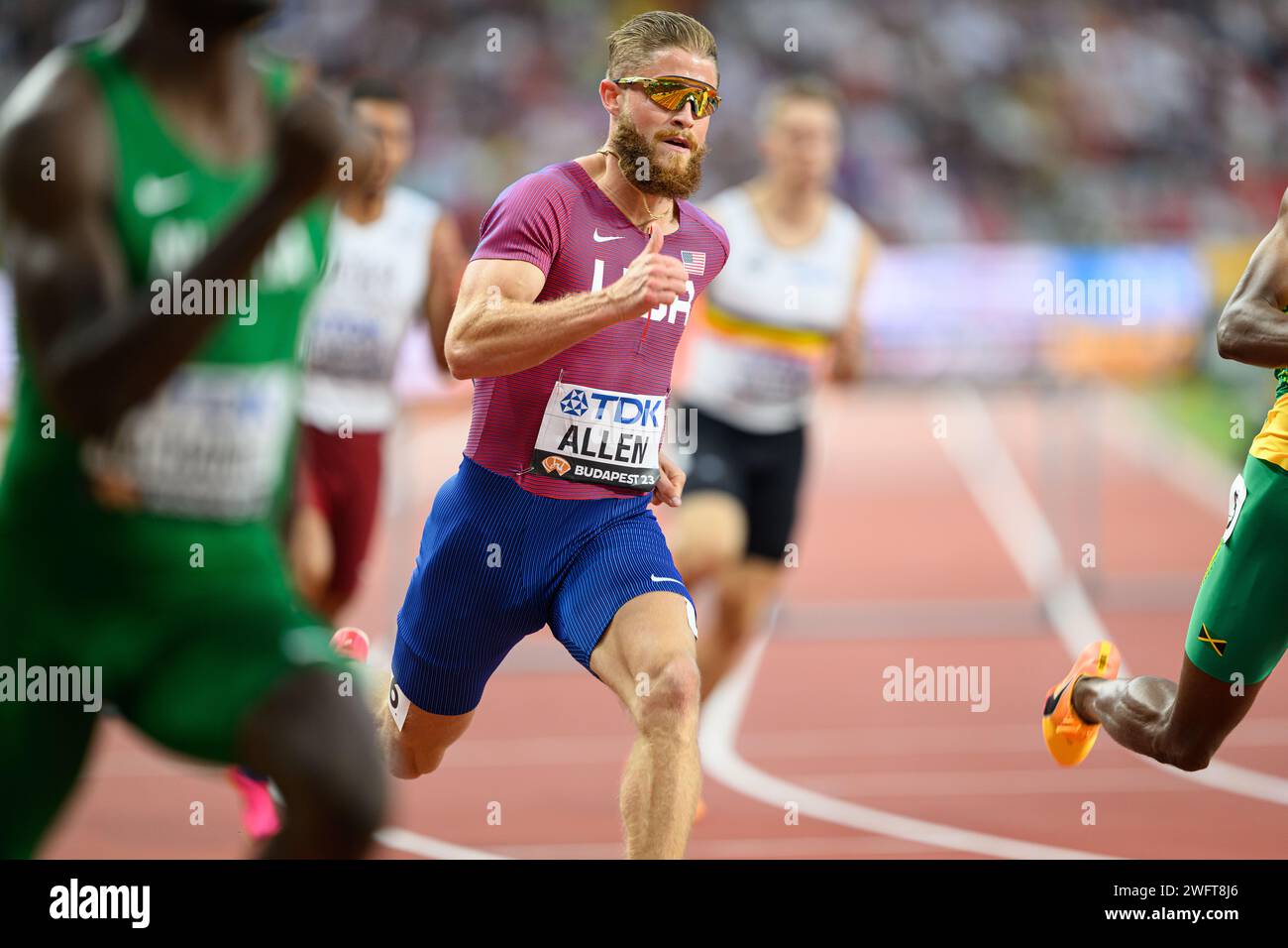 CJ ALLEN participating in the 400 meters hurdles at the World Athletics ...