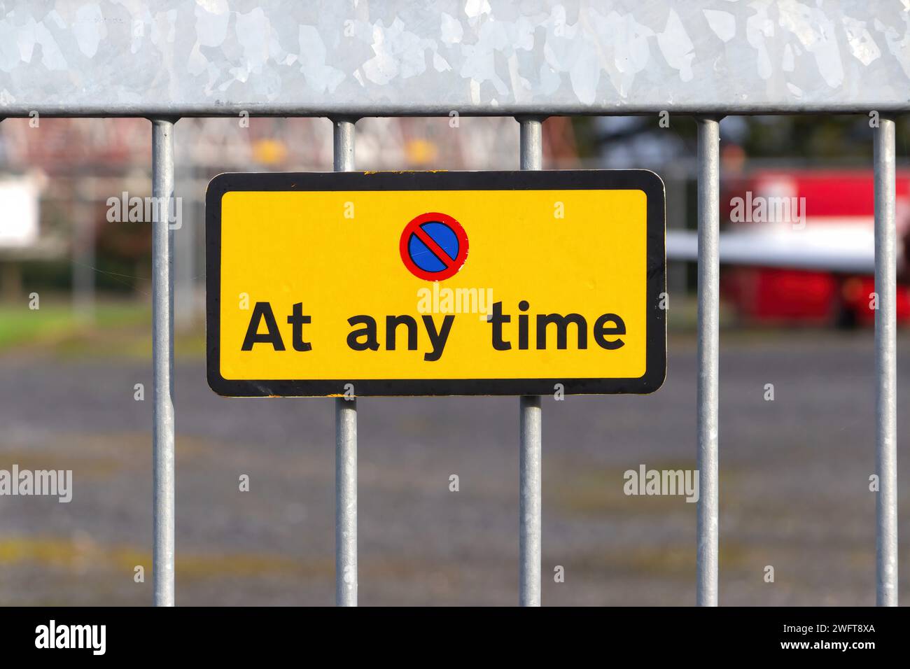 yellow metal no waiting sign on a gate in uk Stock Photo - Alamy