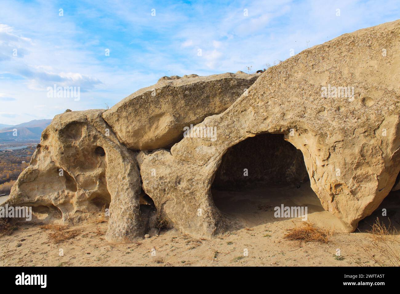 Empty cave is part of old town Uplistsikhe. Ancient city build from ...