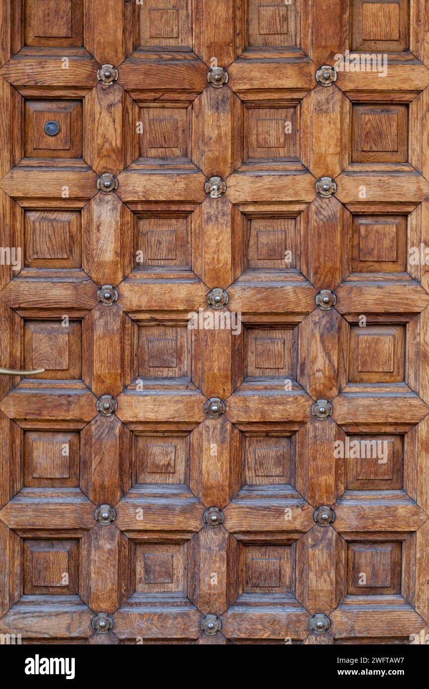 Ancient wooden handcrafted old door. Wooden texture Stock Photo - Alamy