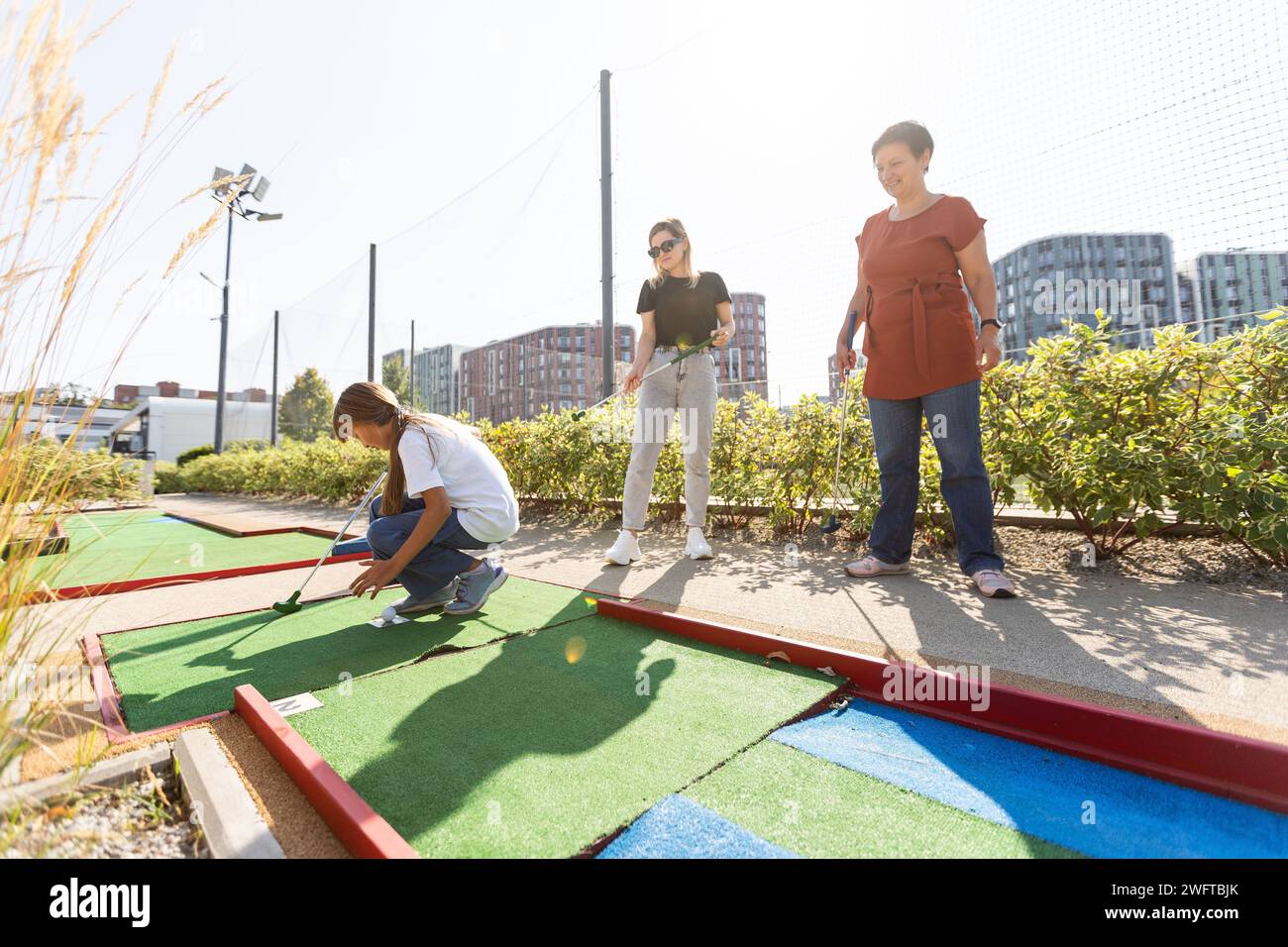 Golf course group of friends people with children posing standing Stock ...