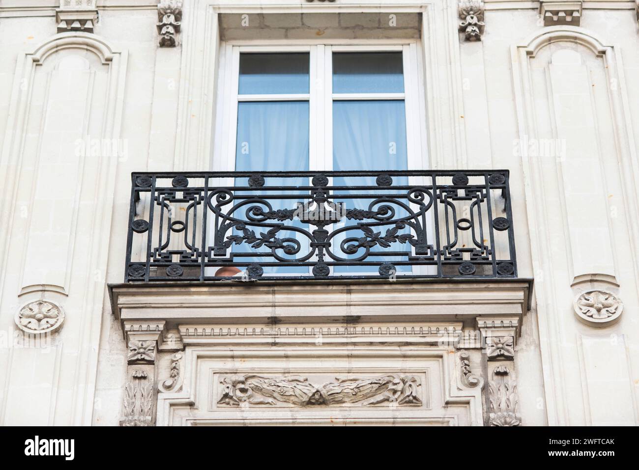 Facade of a beautiful old tenement house in France, historic French ...